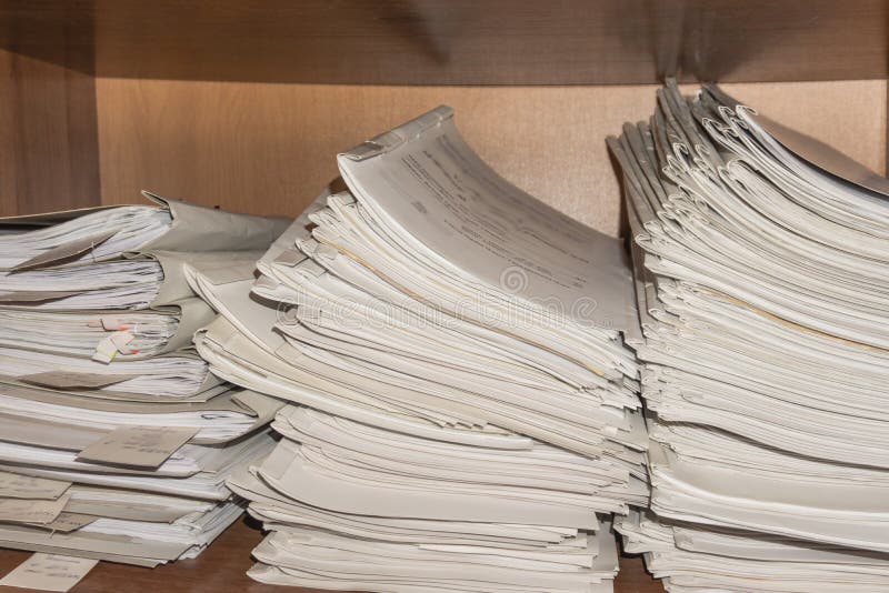 Paper Documents Stacked in Archive. Documents on the Shelves of Archive ...