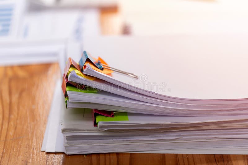 Paper Documents are Stacked on Wooden Desks at the Workplace Stock ...