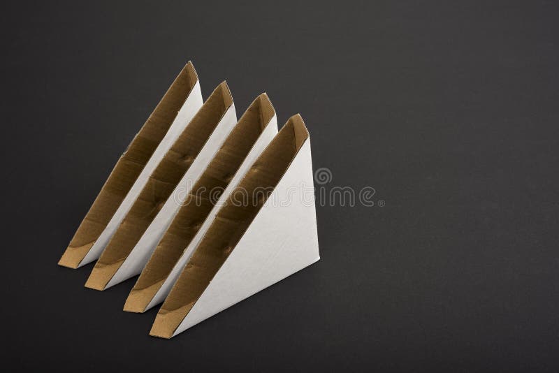 Paper Edge Corner Protector on a Black. Protection in Packaging Stock ...