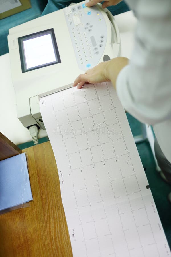 Paper with Electrocardiogram Goes from Printer of Stock Photo - Image ...