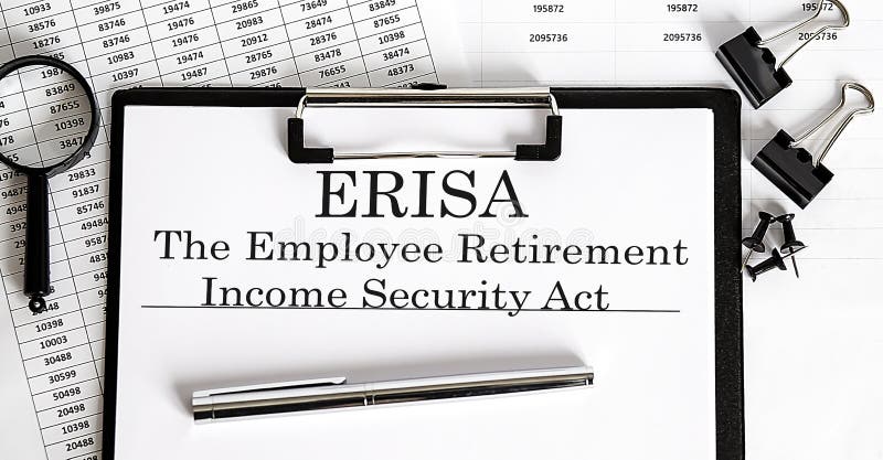 Paper with ERISA - Employee Retirement Income Security Act on the Table ...