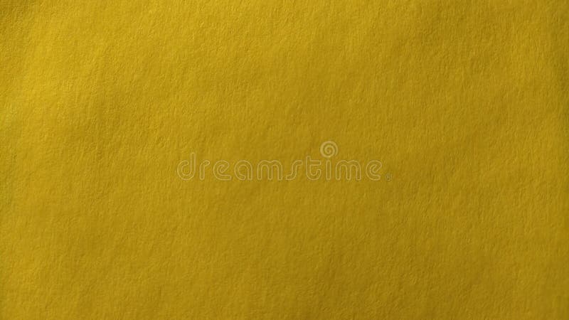 The Paper or Fabric Material is Bright Yellow. Close-up. Slightly ...