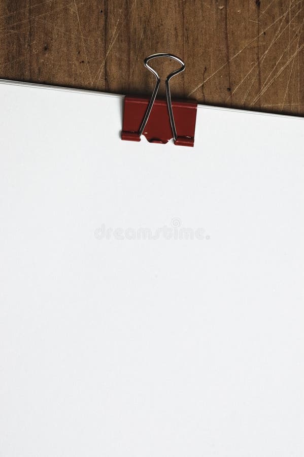 Paper fastened with clip stock image. Image of piece, blank - 5450747