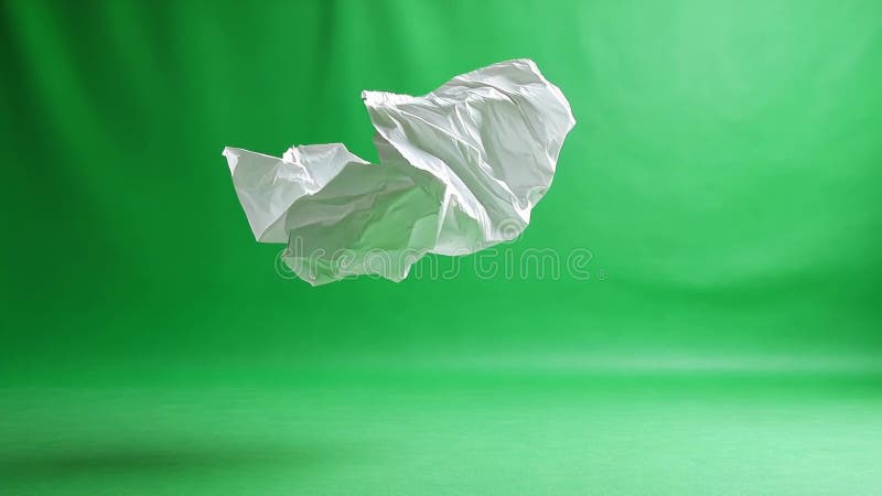 A Paper Flapping Gently As If Caught in an Invisible Wind. Green Screen ...