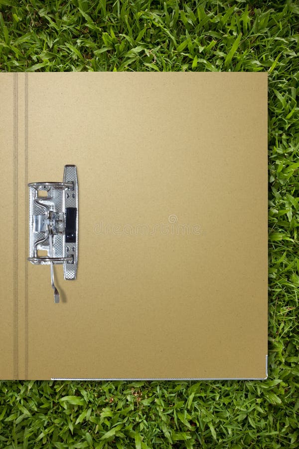 Paper folder on grass stock image. Image of recycle, poster - 25227937