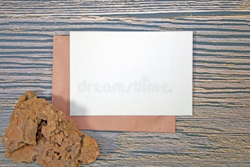 A5 Paper Greeting Card Mockup on Wooden Background Stock Photo - Image ...