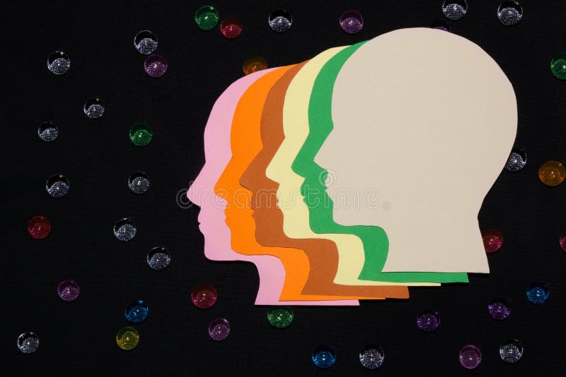 Paper Head a Face that Comes Out of the Face in Different Colors on an ...