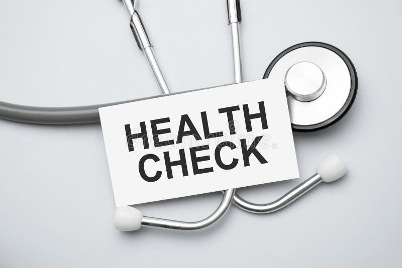 Paper with Health Check on a Table and Grey Stethoscope Stock Photo ...