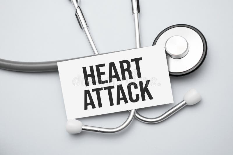 Paper with HEART ATTACK on a Table and Grey Stethoscope Stock Photo ...