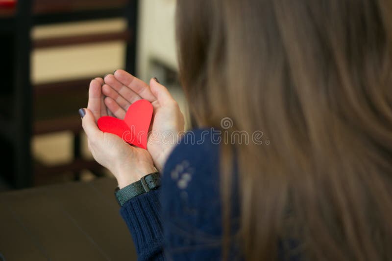 Paper heart in hands stock image. Image of hands, valentines - 36979941