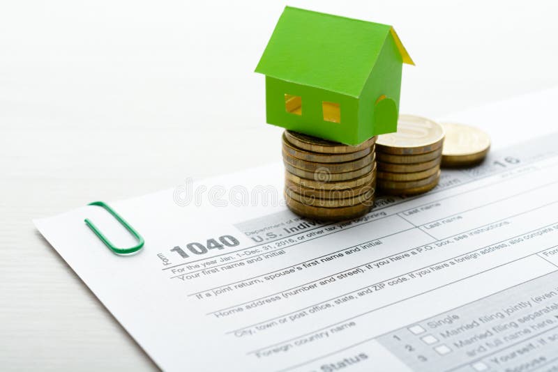 Paper house and tax form editorial photo. Image of payment - 83760881