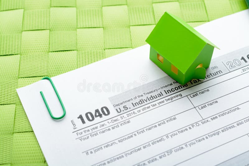 Paper house and tax form editorial photo. Image of home - 83760266