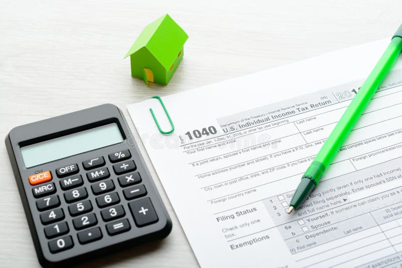 Paper house and tax form editorial photo. Image of return - 83760556