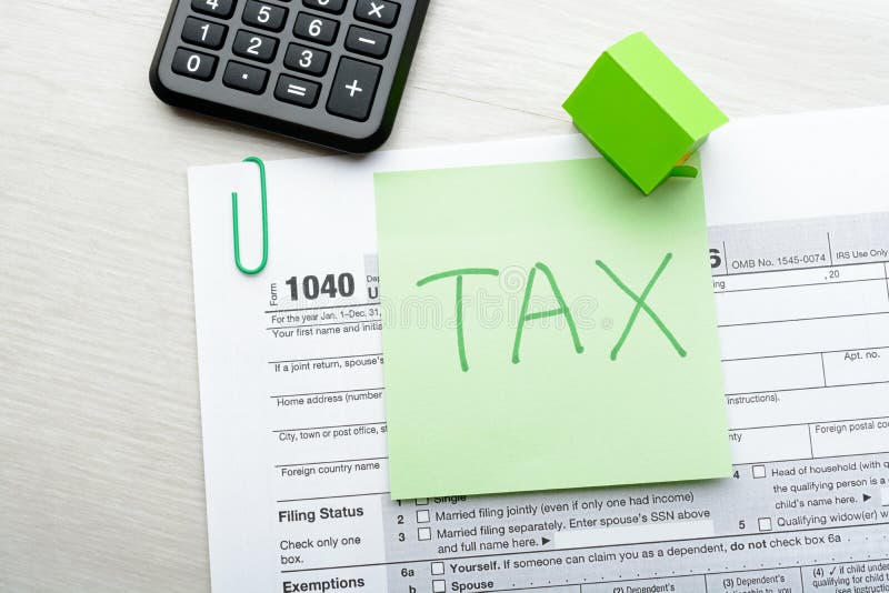 Paper house and tax form editorial photo. Image of home - 83760891