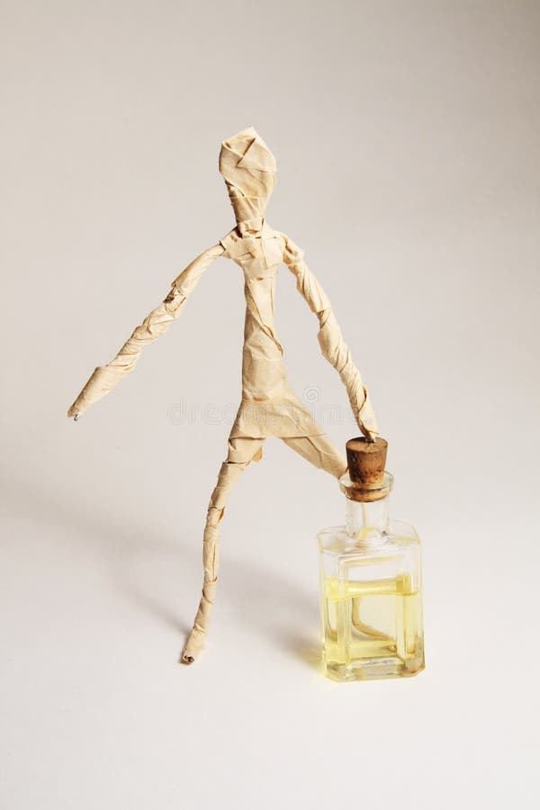 The Paper Human with Bottle of Oil Stock Photo - Image of retreat ...