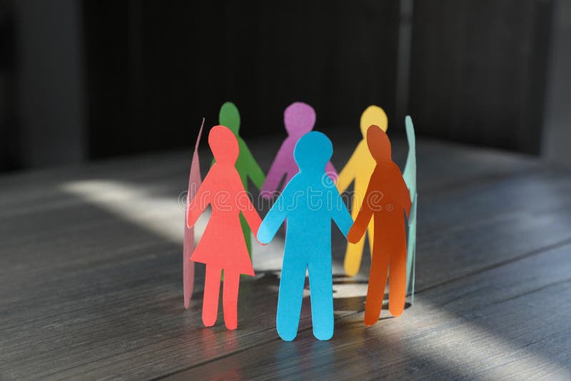 Paper Human Figures Making Circle on Wooden Table. Diversity and ...