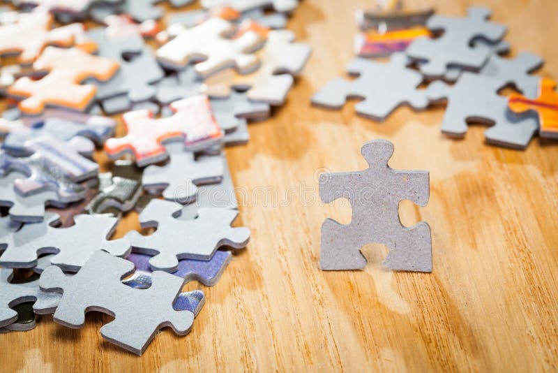 Paper jigsaw puzzle stock photo. Image of jigsaw, depth - 61843412