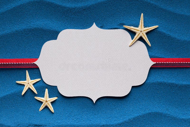 Paper Label And Red Ribbon On Blue Sand Background Stock Image - Image ...