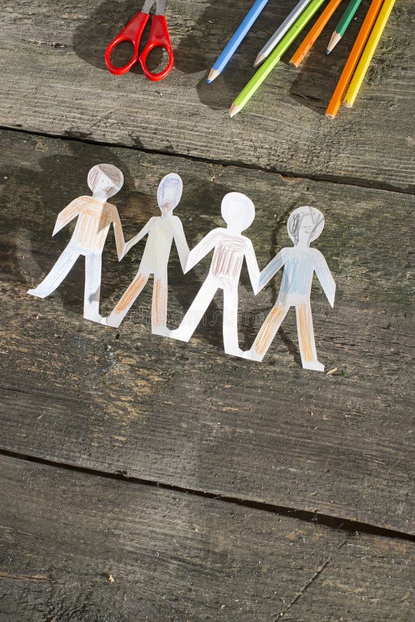 Paper made people figures stock image. Image of hand - 59654963