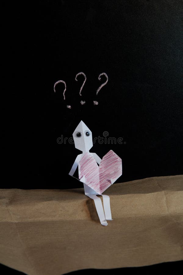 The Paper Man in Love is Puzzled Stock Photo - Image of business, card ...