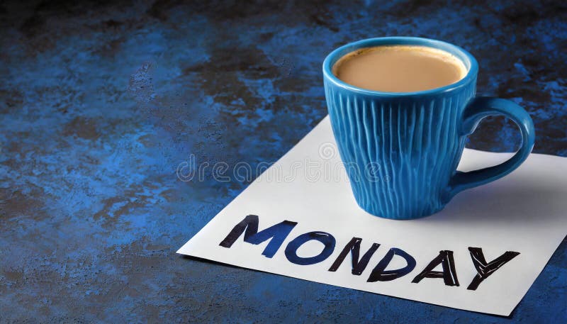 Paper with Monday Text on Dark Blue Background Next To a Coffee Cup ...