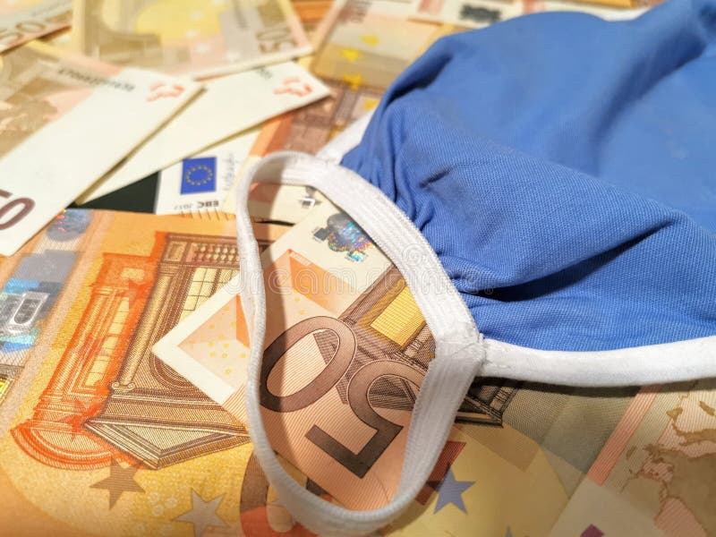 Paper Money and Face Mask Protection for Coronavirus Stock Photo ...