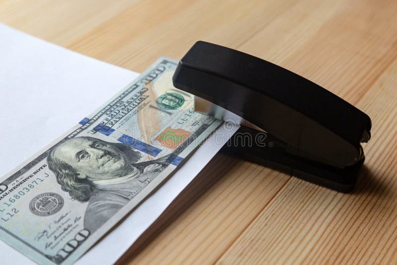 The Paper Money is Pinned To the Document. Concept Stock Image - Image ...