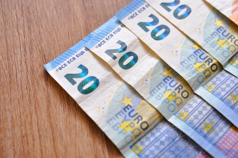Twenty euros on a table stock photo. Image of writing - 331613164