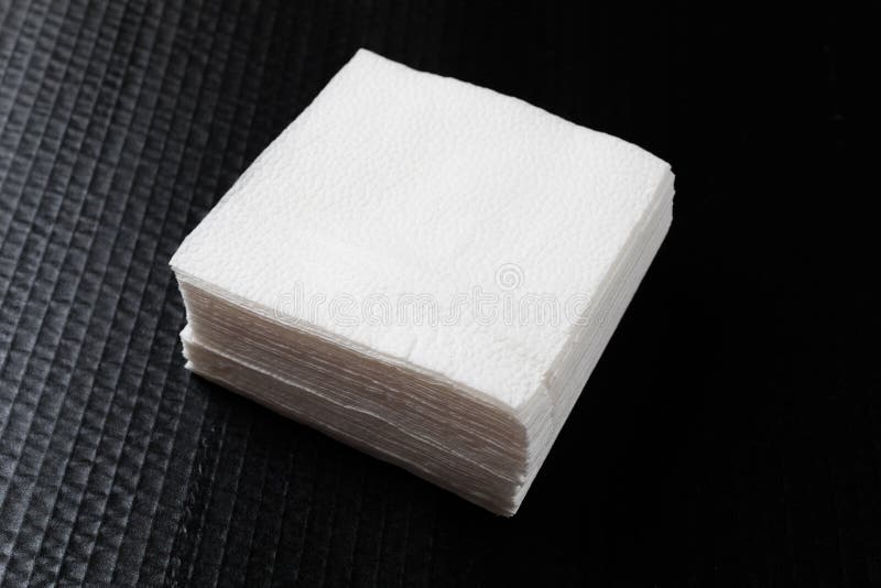 Paper Napkin on Black Background Stock Photo - Image of pattern, folded ...