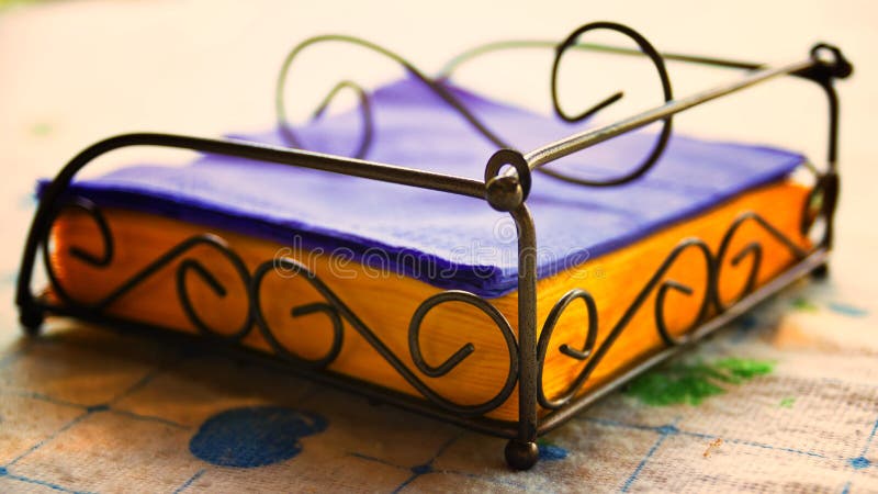 Paper Napkins Holder with Violet and Orange Paper Napkins Stock Image ...