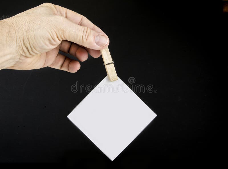 Paper Note on the Finger Fixed with Clothes Pin. Stock Image - Image of ...