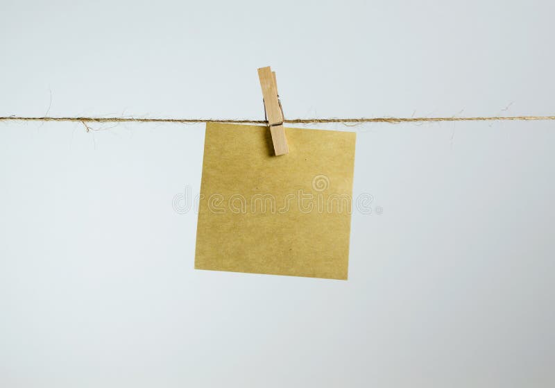 Paper note on a rope stock photo. Image of clothes, clip - 69905574