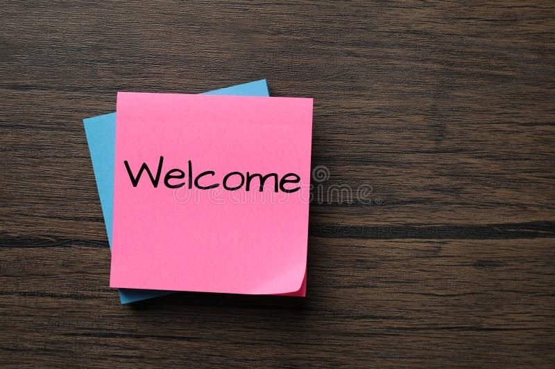 Paper Note with Word Welcome on Wooden Table, Top View. Space for Text ...