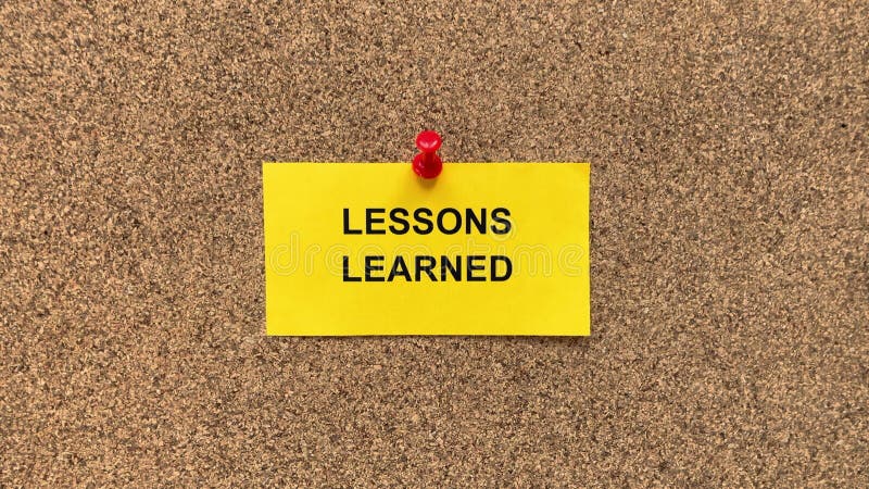 A Paper Note with the Words Lessons Learned Written on it Pinned To a ...