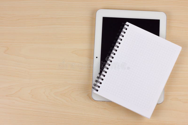 Paper Notebook and Electronic Device on Wood Table Stock Image - Image ...