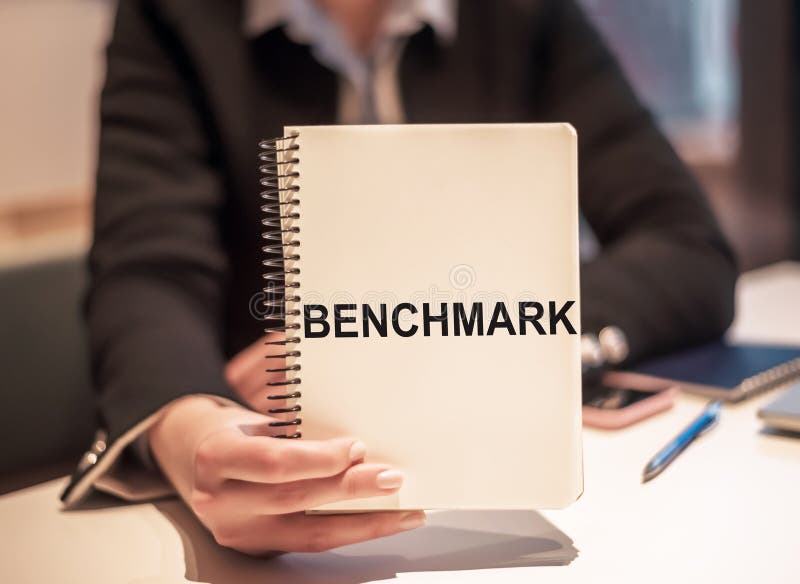 Paper Notepad with the Text BENCHMARK. Business Concept Stock Photo ...