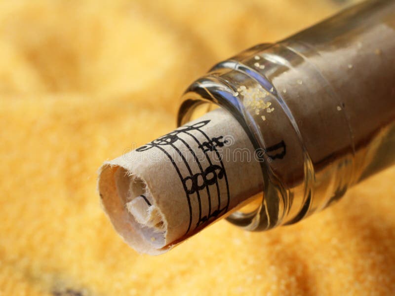 Paper Notes Roll in a Bottle on the Sand Stock Image - Image of ...