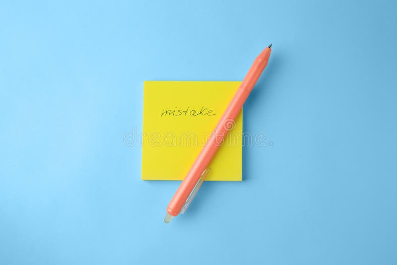 Paper Notes with Word Mistake and Erasable Pen on Light Blue Background ...