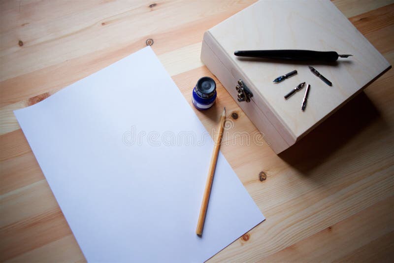Paper and Objects for Writing and Drawing Lie on the Surface of the ...