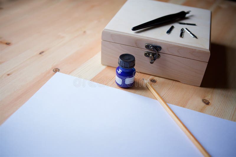 Paper and Objects for Writing and Drawing Lie on the Surface of the ...