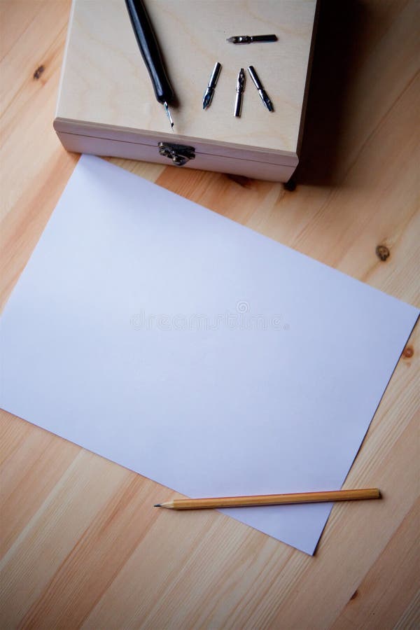 Paper and Objects for Writing and Drawing Lie on the Surface of the ...