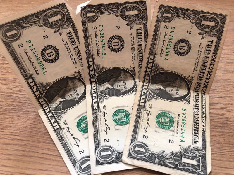 Paper One Dollar Bills on a Light Background Stock Image - Image of ...