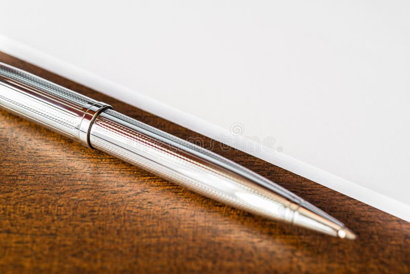 Paper and pen on the table stock image. Image of paper - 45955943