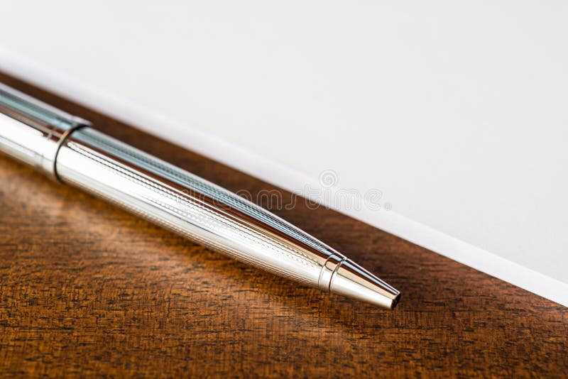 Paper and pen on the table stock photo. Image of paper - 45955946
