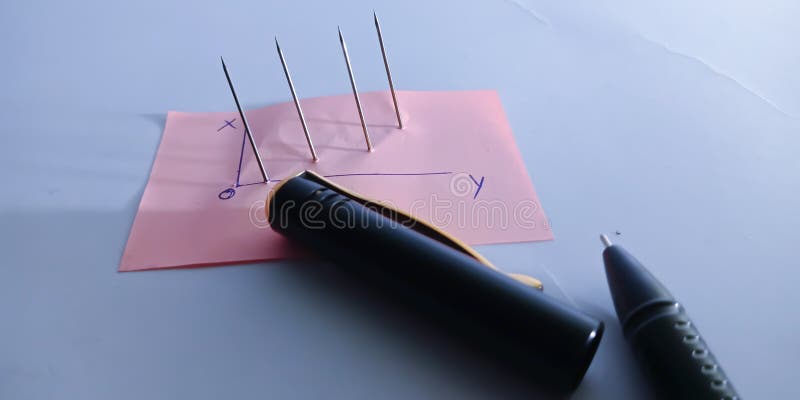 Paper Pin Graph Pattern on Slip with Pen Stock Photo - Image of ...