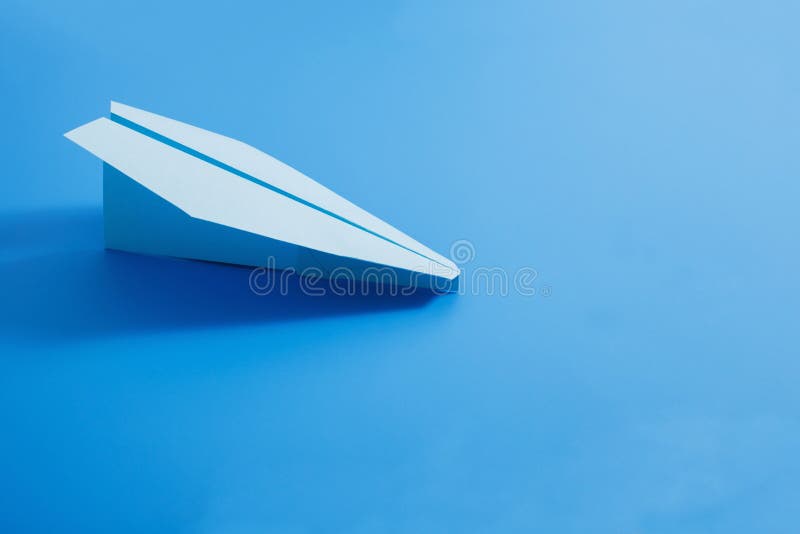 Paper Plane on Blue Color Background Stock Image - Image of plane ...