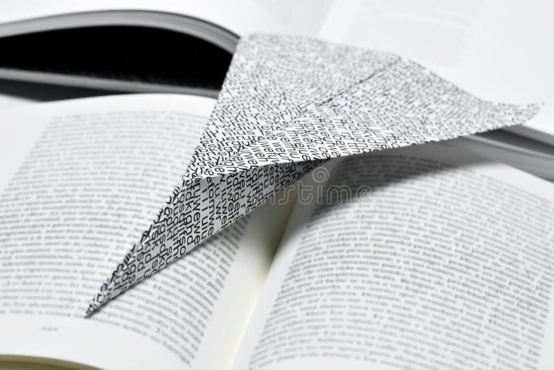 Paper Plane on an Open Book Stock Image - Image of exploration, plane ...