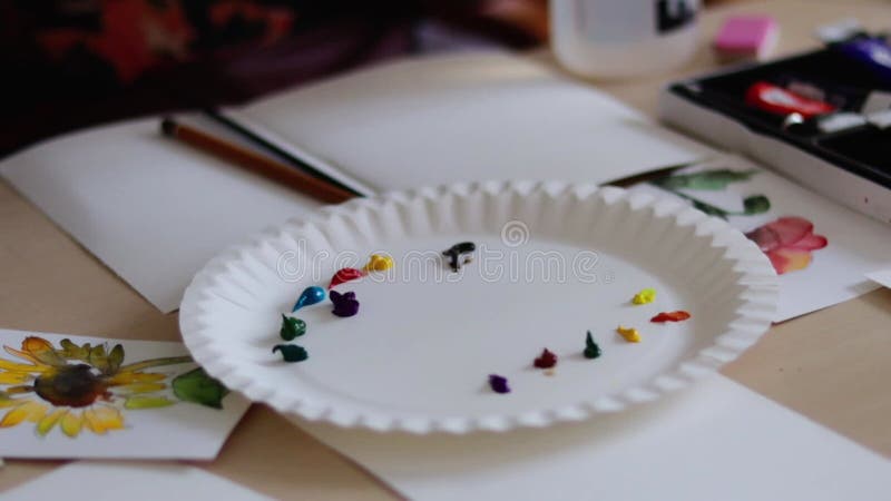 Paper Plate with Different Samples of Watercolor Paint at a Master ...