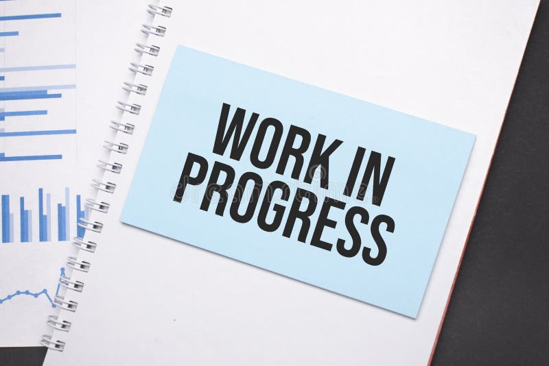 Paper Plate with Text Work in Progress. Diagram, Notepad and Blue ...