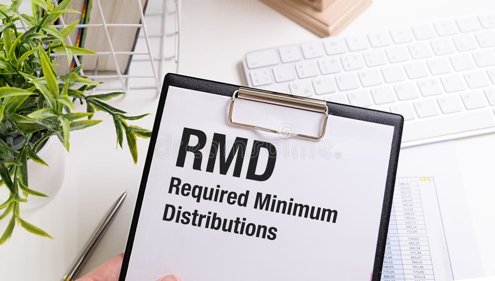 Paper with Required Minimum Distributions RMD on a Table Stock Image ...